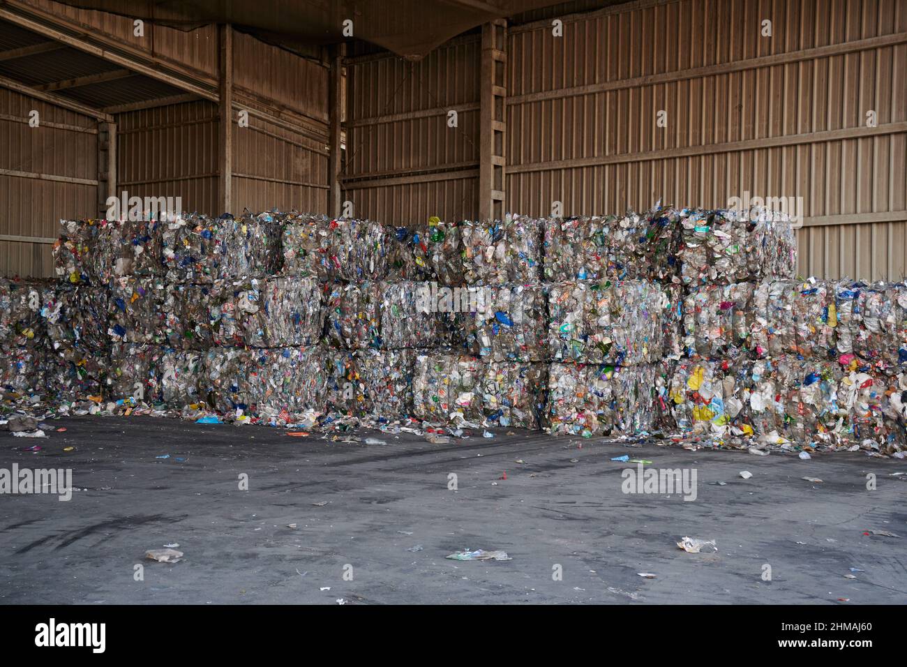 View of crushed waste in cubes ready for disposal Stock Photo - Alamy