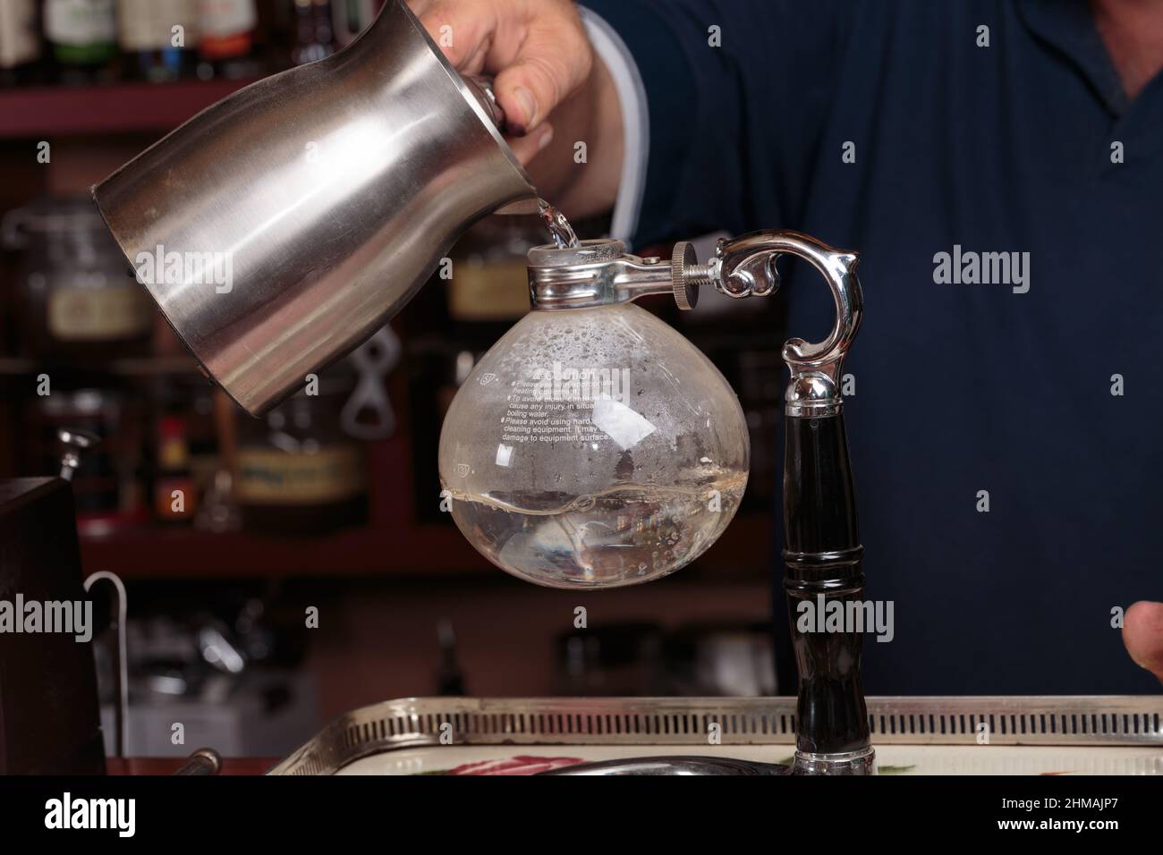 Vacuum siphon classic coffee maker. Close-up Stock Photo - Alamy