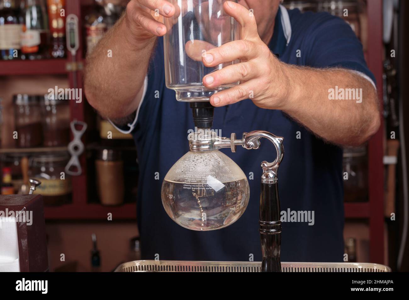 Vacuum siphon classic coffee maker. Close-up Stock Photo - Alamy