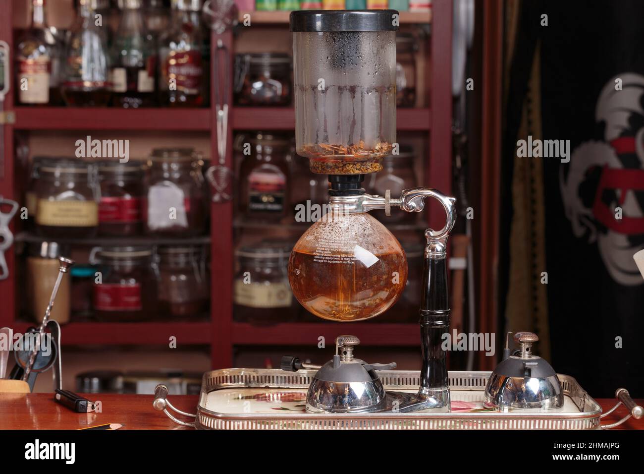 Making herbal tea with a vacuum siphon. Close-up Stock Photo - Alamy