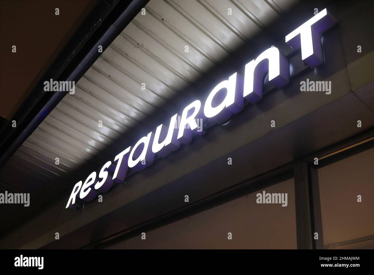 View of restaurant sign board at night Stock Photo - Alamy