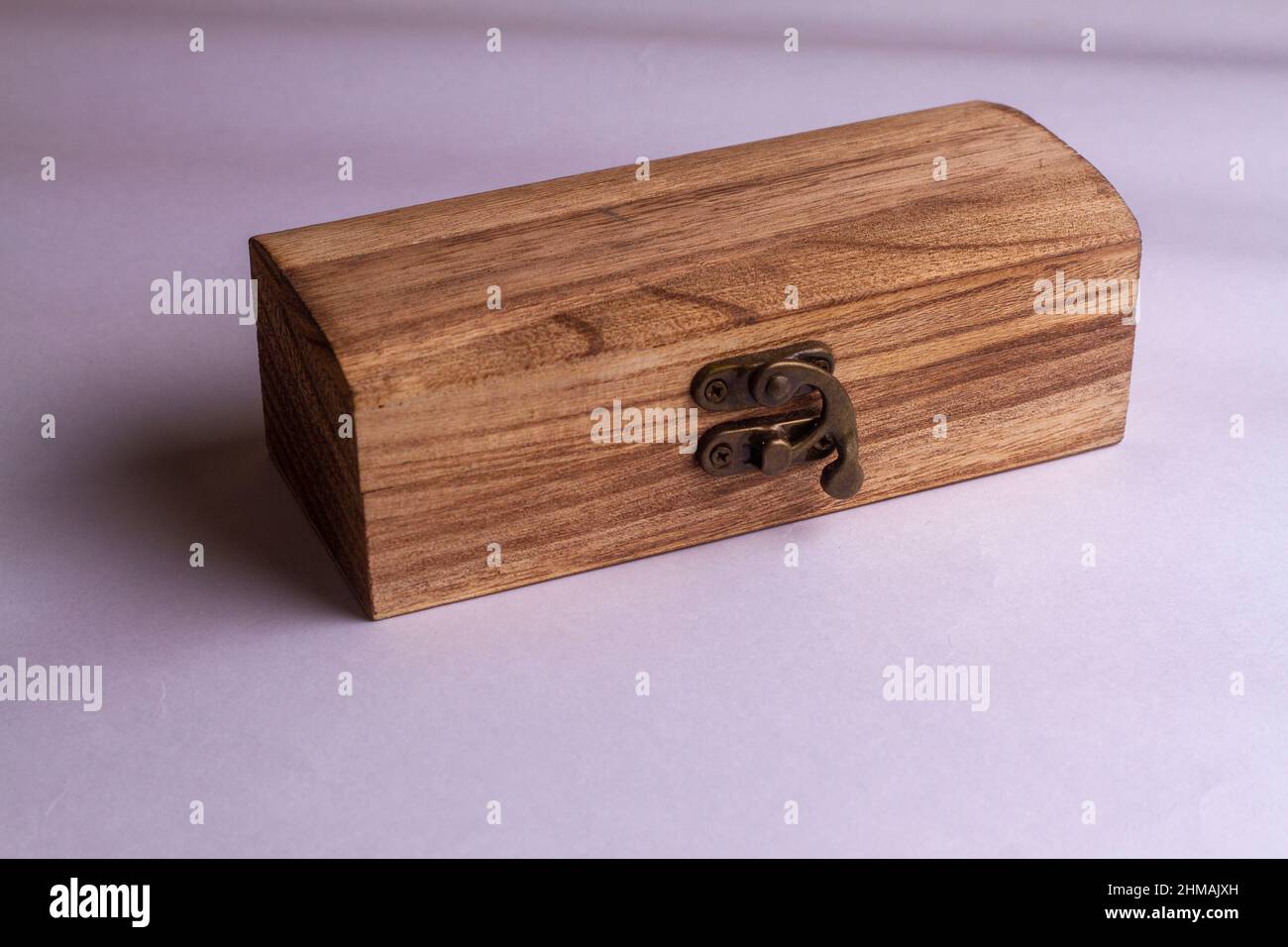A generic studio product shot of a traditionally crafted wood box on a ...