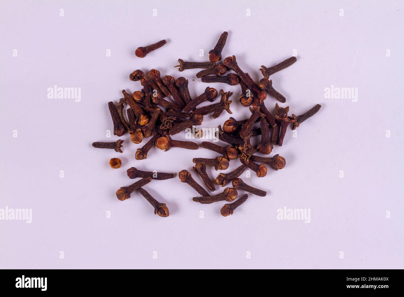 Cloves isolated on white background top view Stock Photo - Alamy