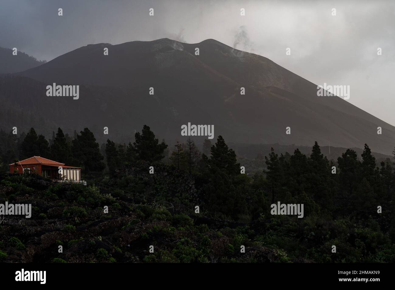 A residential house is seen near the Cumbre Vieja volcano which is ...
