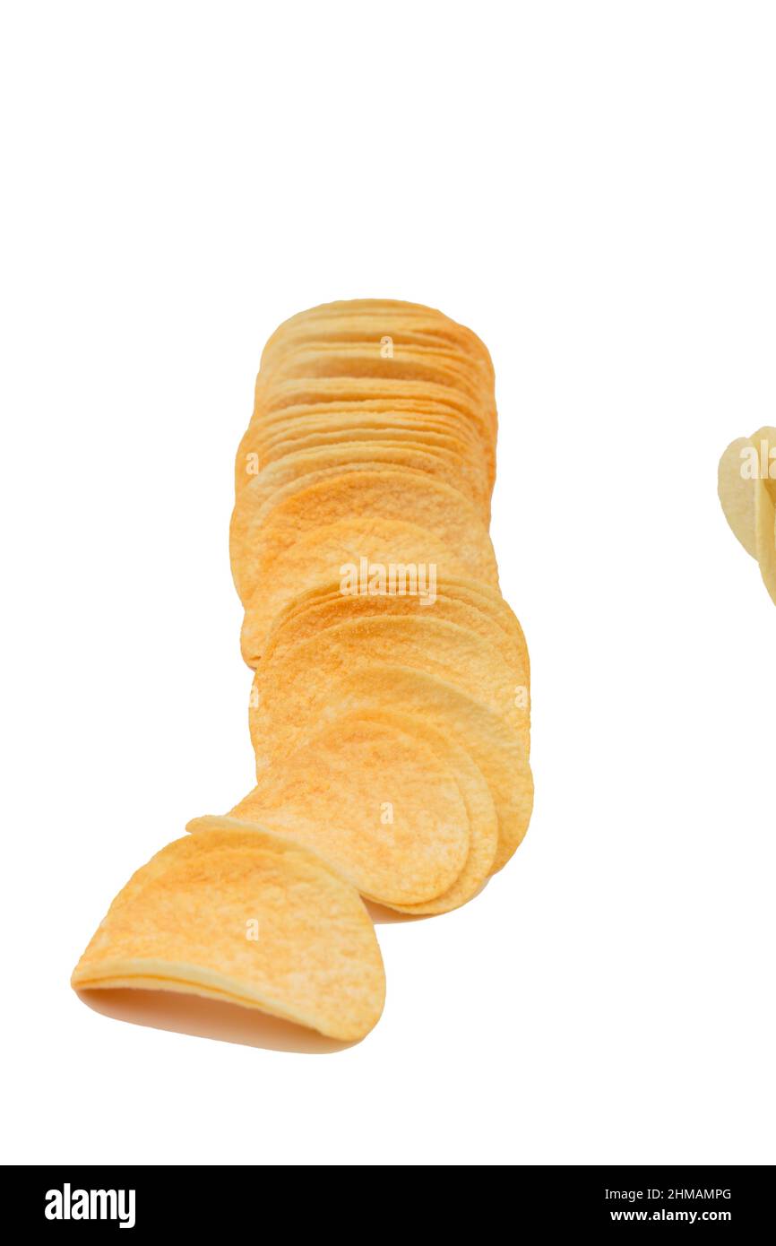 A stack of potato chips. Isolated over white background. Close-up Stock ...