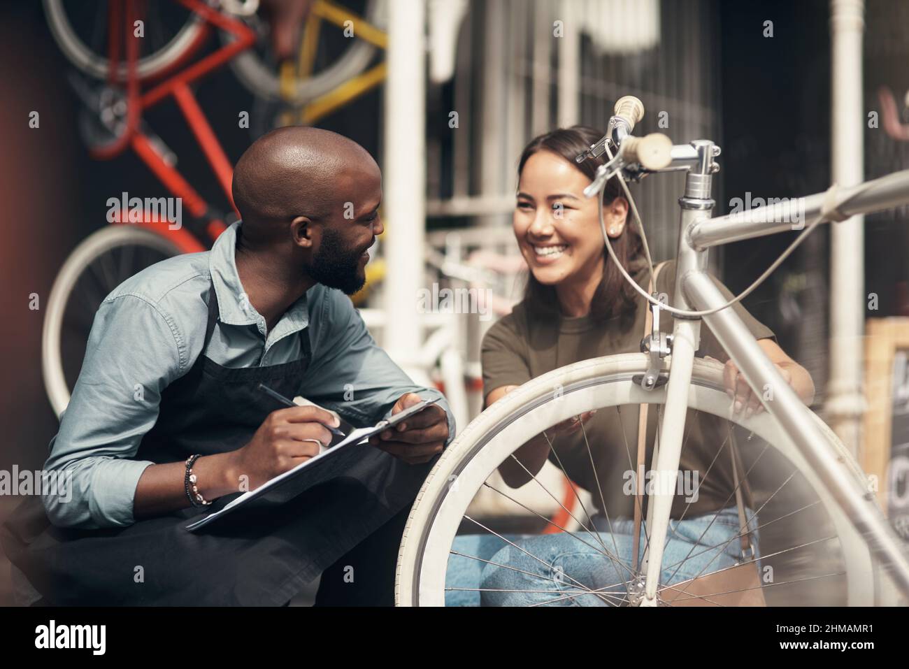 I cant wait to take it home. Shot of a handsome young man crouching ...