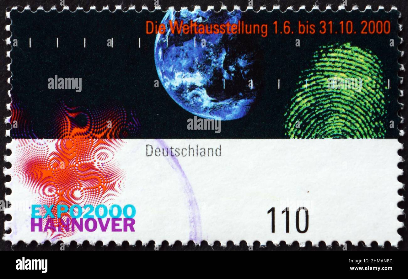 GERMANY - CIRCA 2000: a stamp printed in Germany shows EXPO 2000 emblem ...