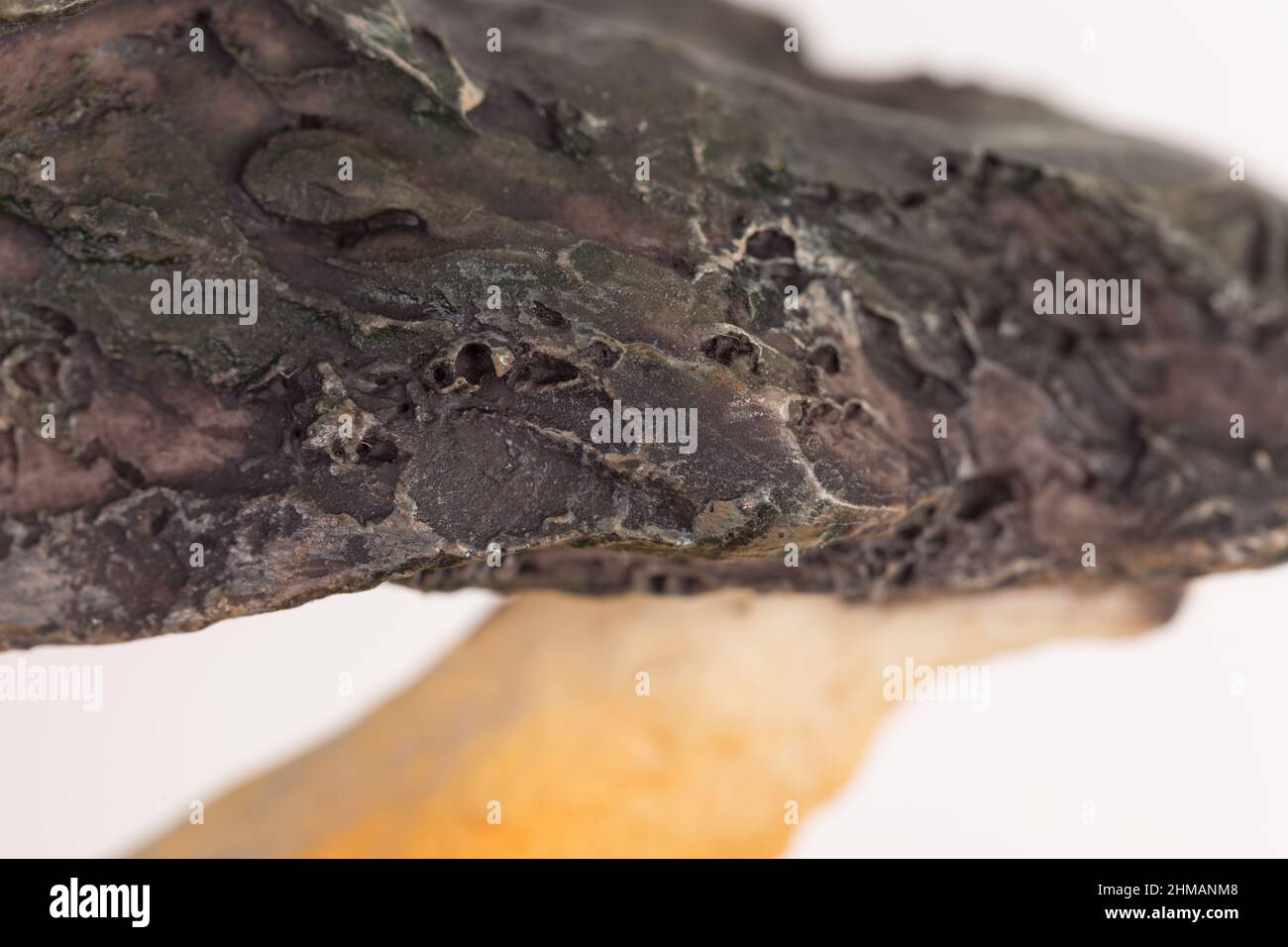 A fracture of a stone of volcanic origin or artificial. Close-up Stock ...