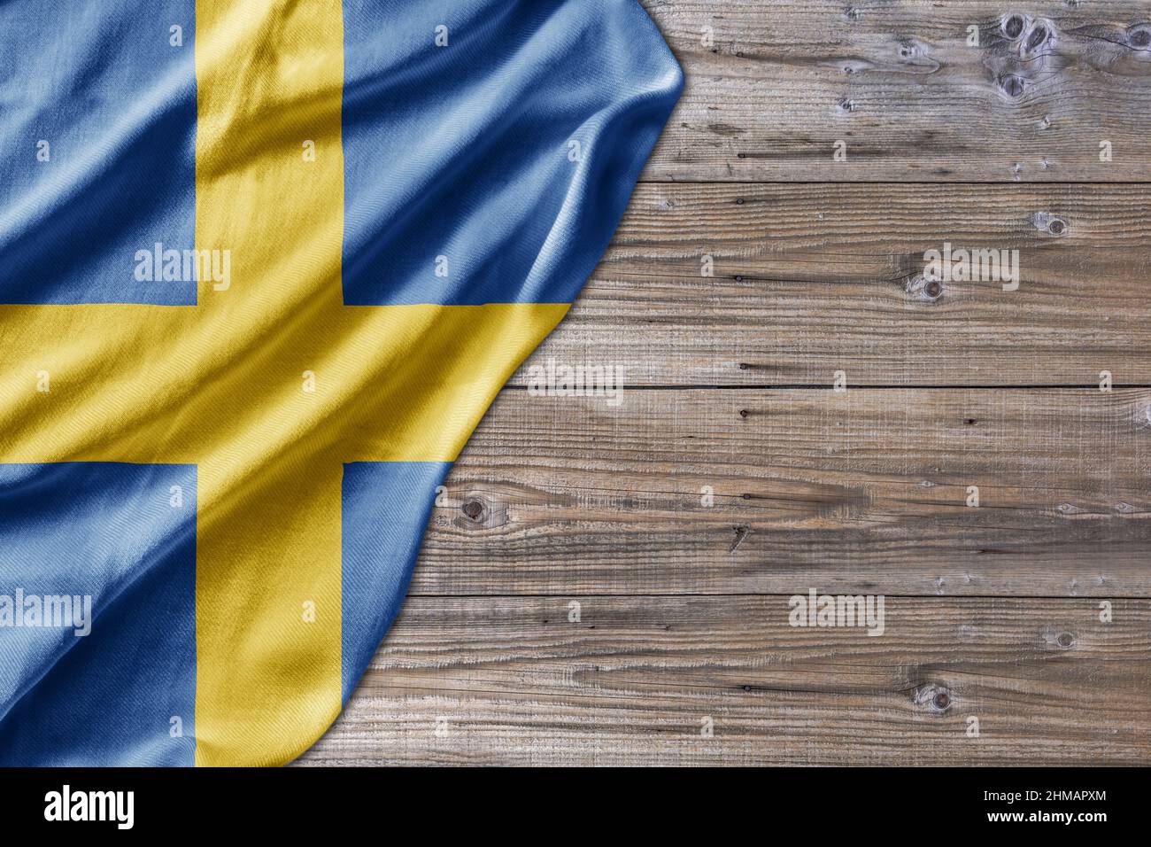Wooden pattern old nature table board with Sweden flag Stock Photo - Alamy