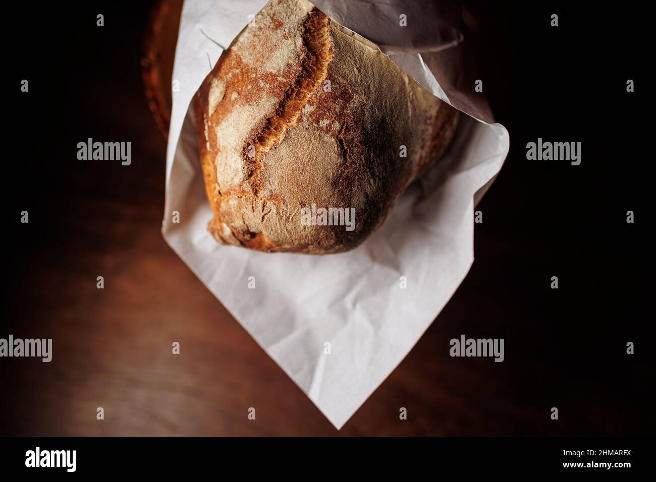 Bread in paper hi-res stock photography and images - Alamy