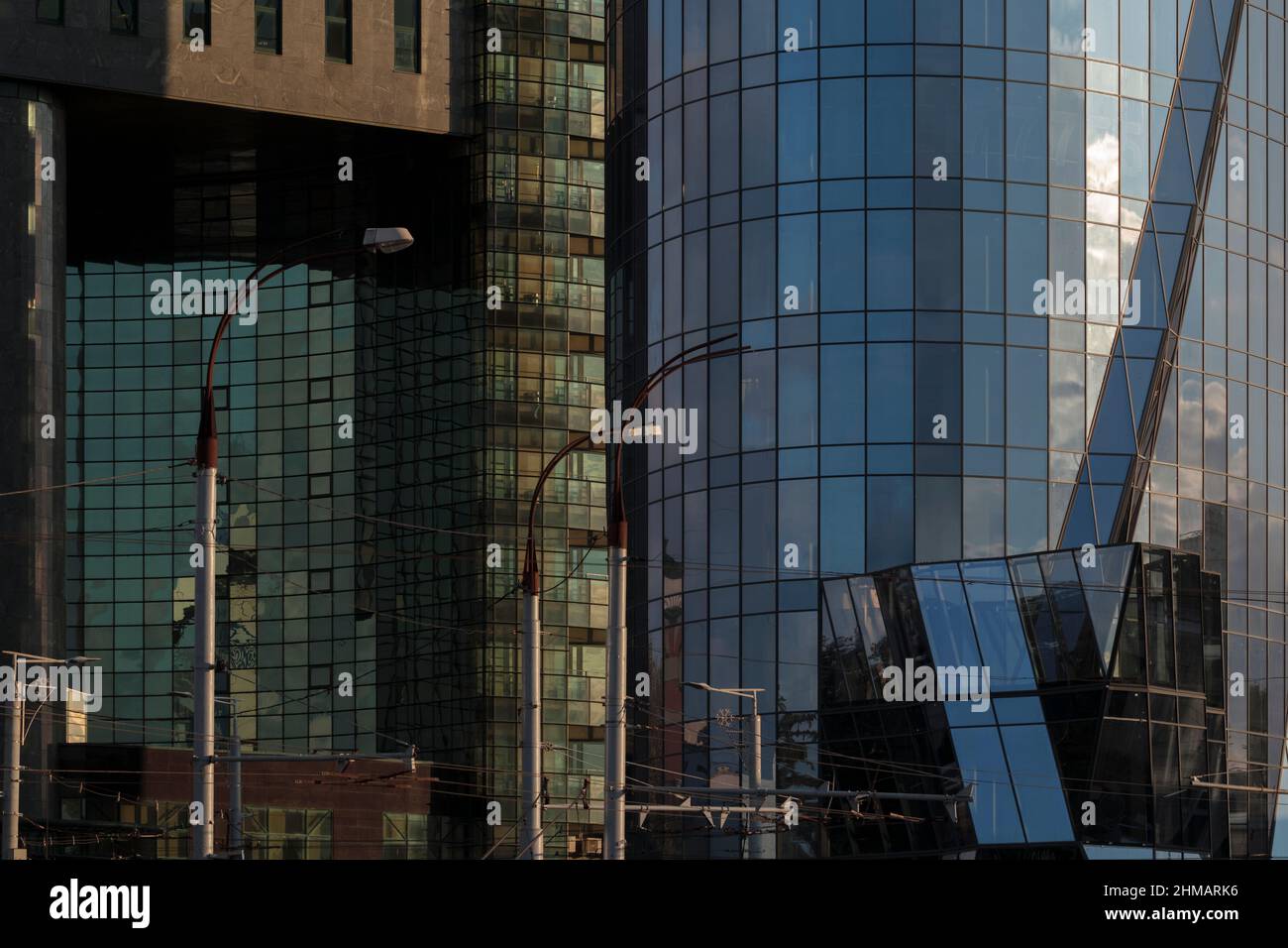 Green glass facade and blue glass facade. Close-up Stock Photo - Alamy