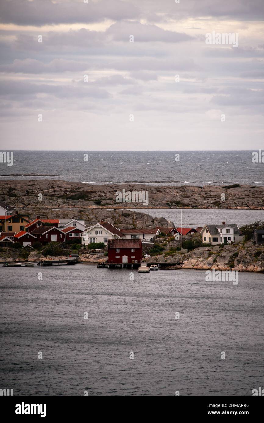 Vertical shot of modern houses near the water Stock Photo - Alamy