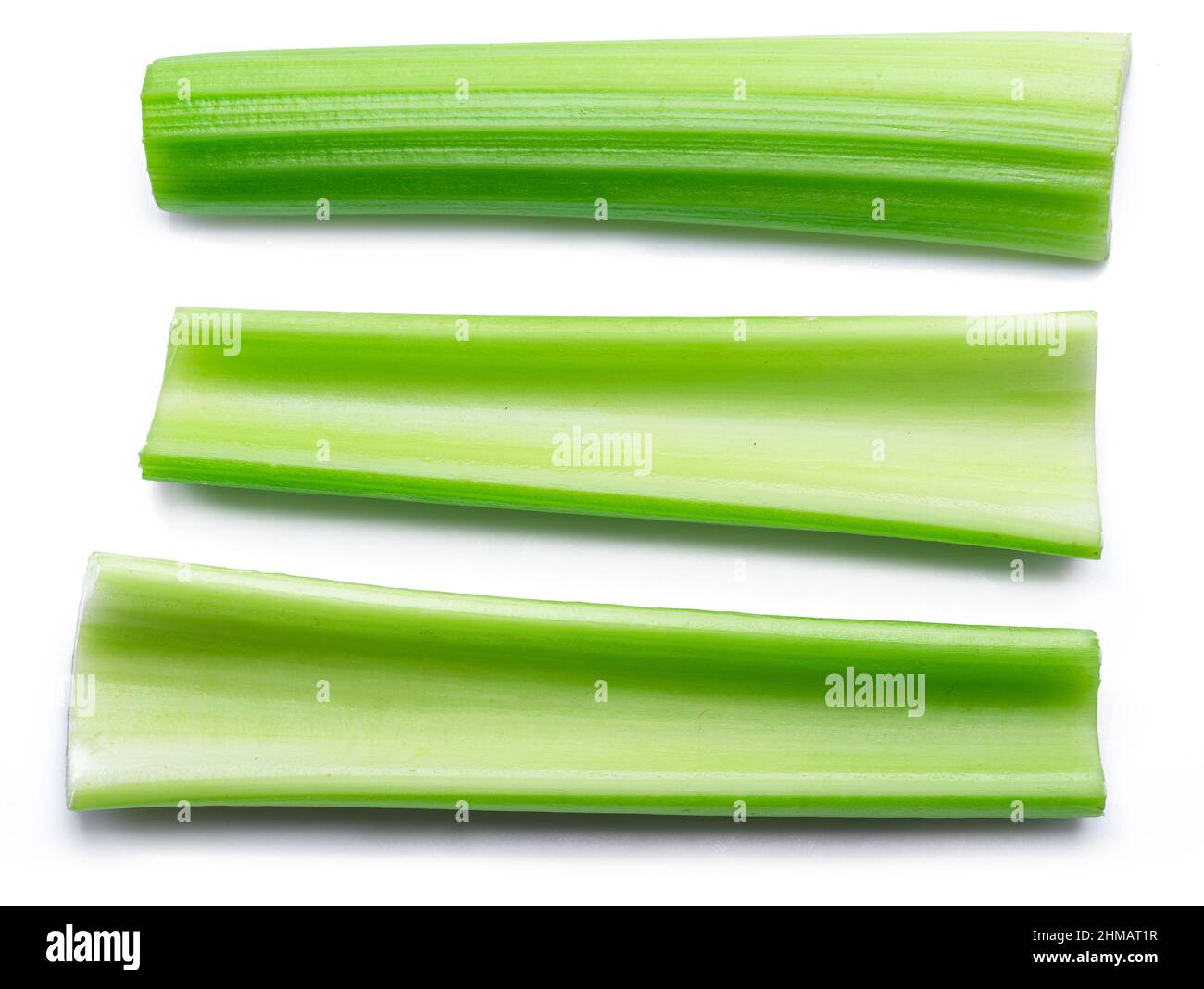 Pile of celery ribs isolated on white background Stock Photo - Alamy