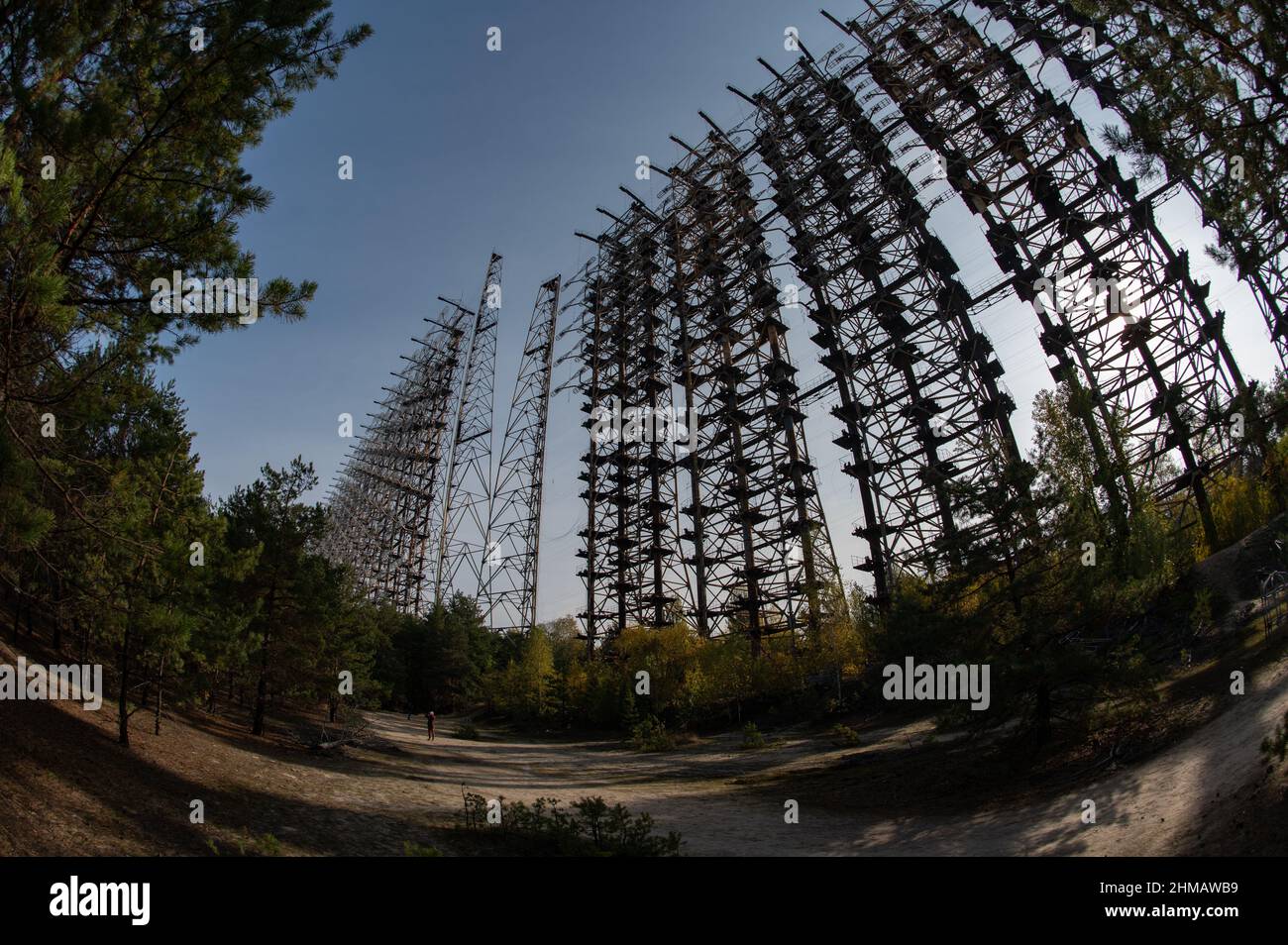 A man stands in front of the powerful and once secret Soviet Duga radar ...