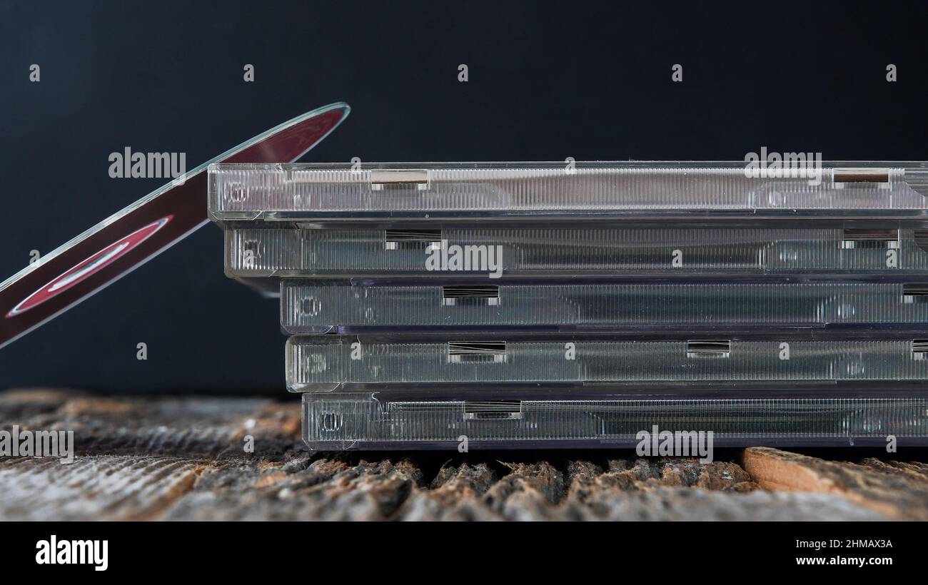 CD plastic box with one CD out on rustic wooden board table Stock Photo ...