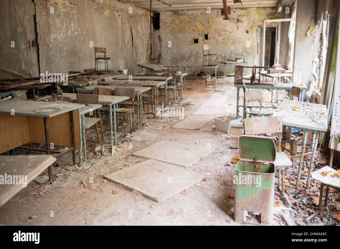 Educational material like books, furniture and posters abandoned in a ...