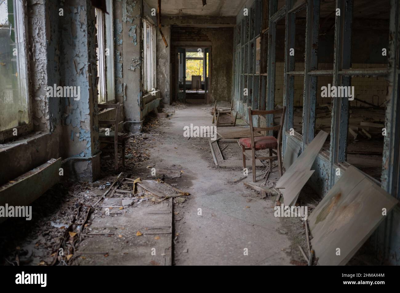 Educational material like books, furniture and posters abandoned in a ...