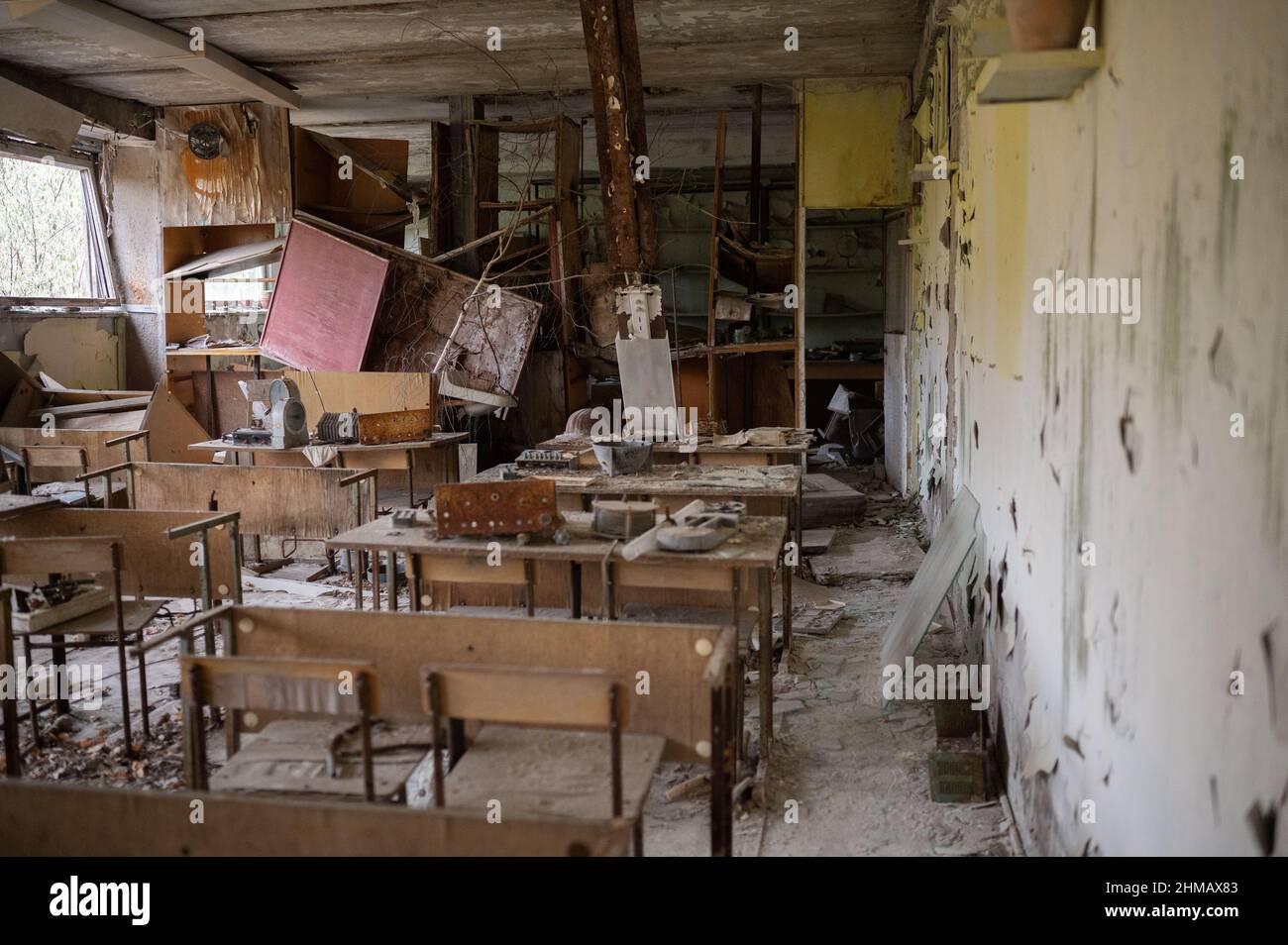 Educational material like books, furniture and posters abandoned in a ...