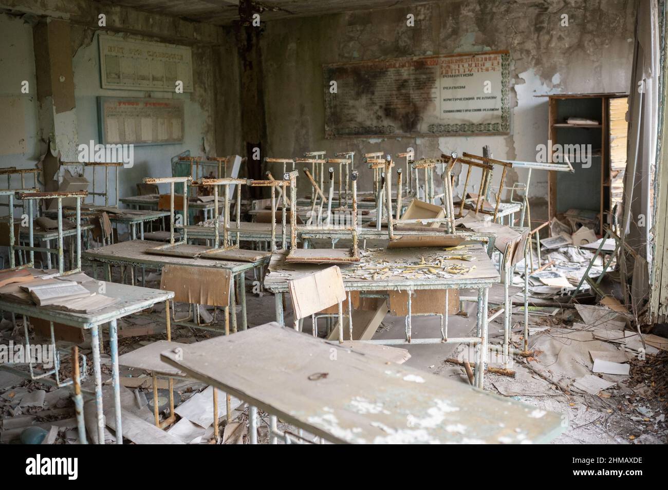 Educational material like books, furniture and posters abandoned in a ...