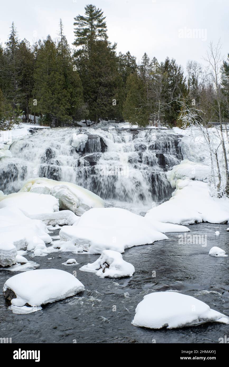 Winter photograph of Bond Falls, a step falls on the Middle Branch of ...