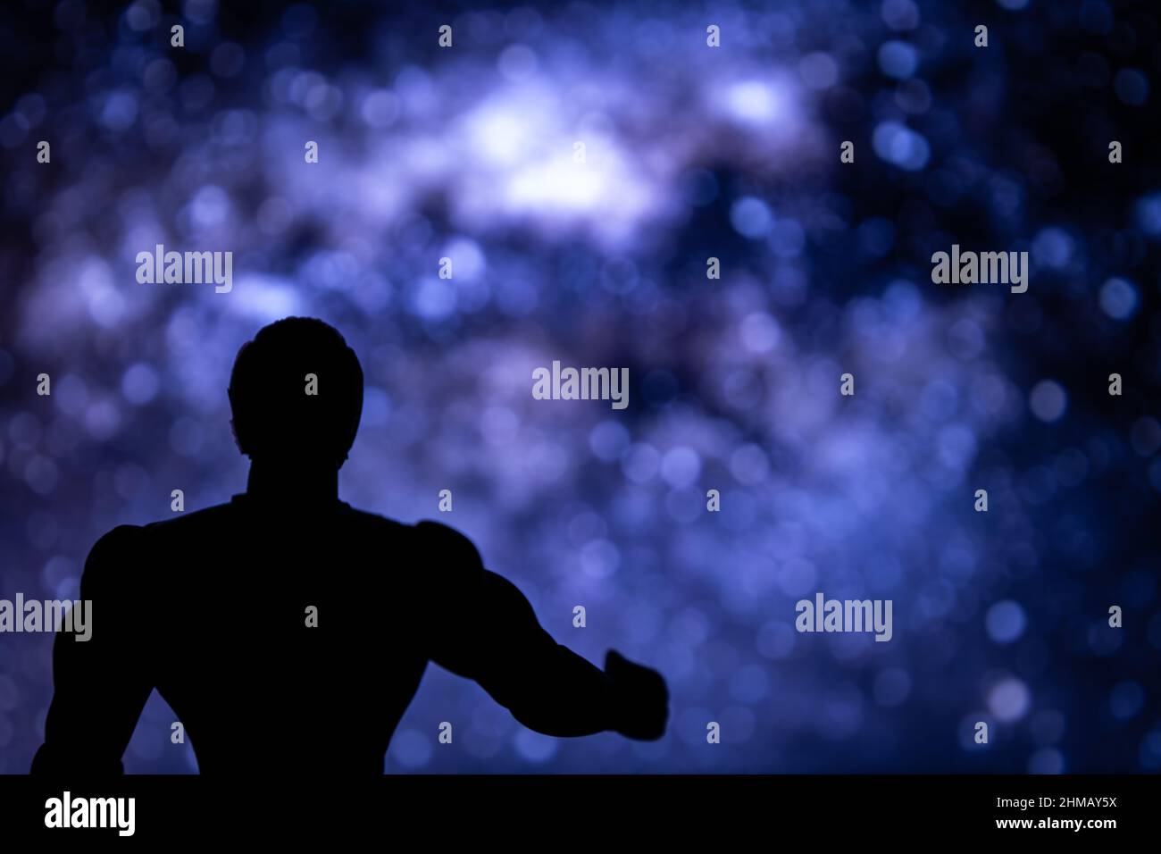 Figure of a blurred humanoid with stars in the sky behind. concept of ...