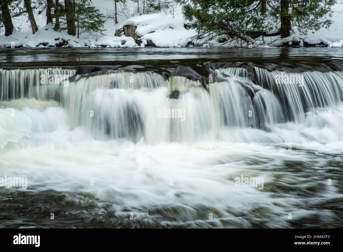 Winter photograph of Bond Falls, a step falls on the Middle Branch of ...