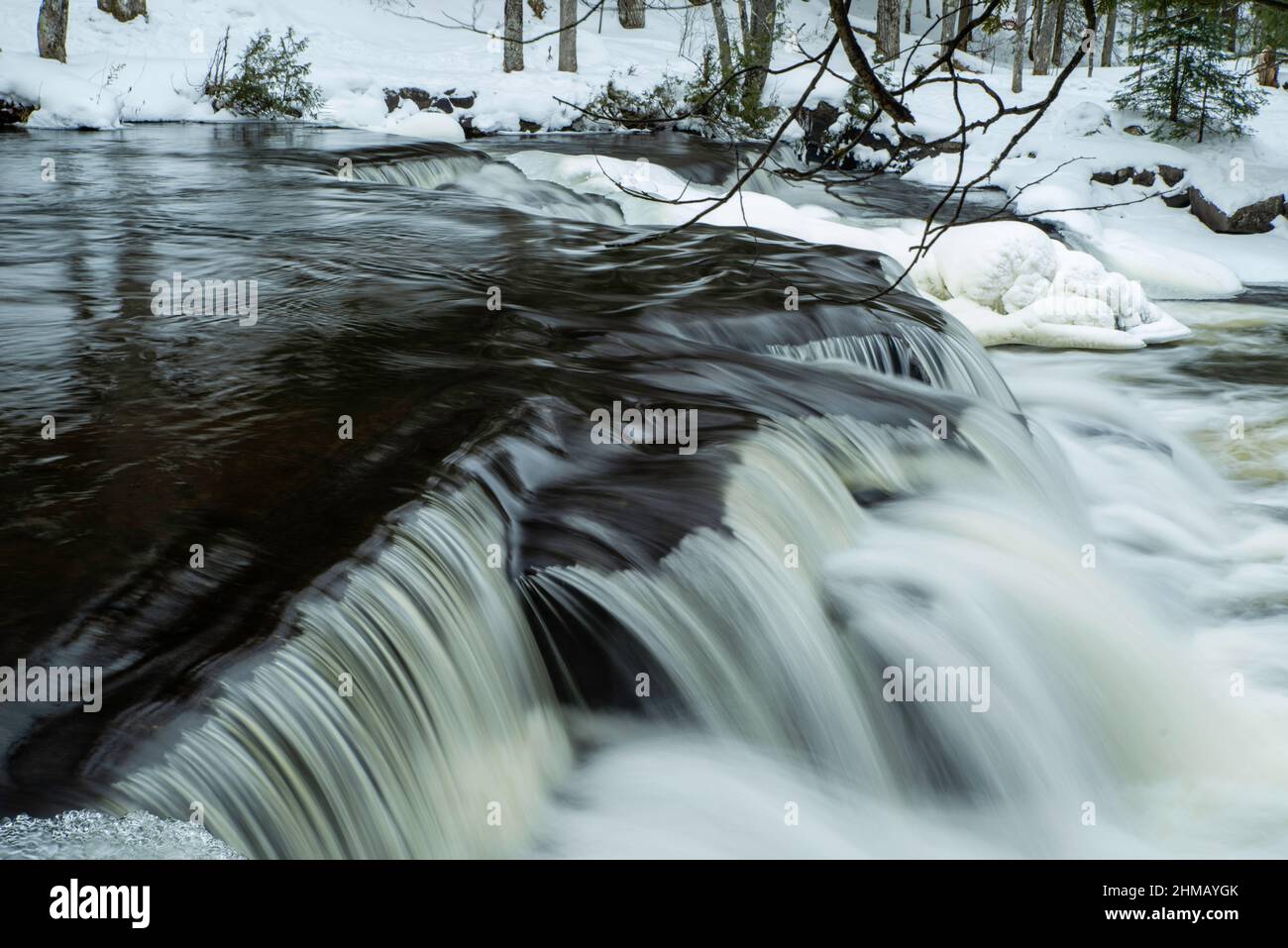 Winter photograph of Bond Falls, a step falls on the Middle Branch of ...