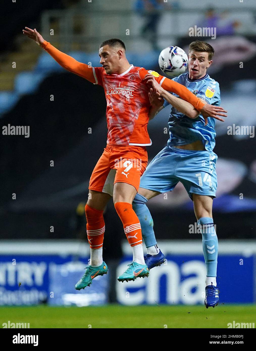Blackpool's Jerry Yates (left) and Coventry City's Ben Sheaf battle for ...