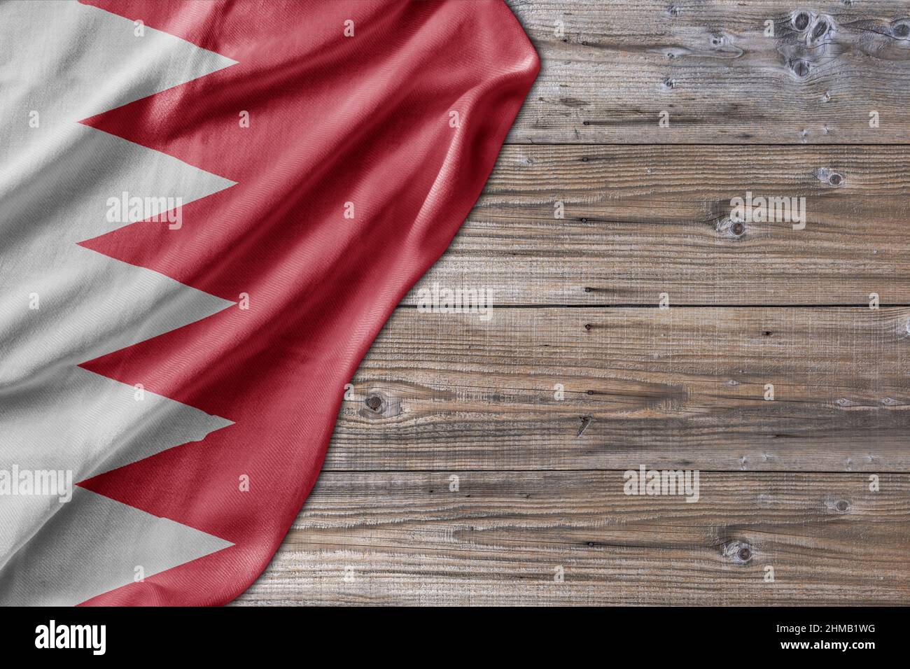 Wooden pattern old nature table board with Bahrain flag Stock Photo - Alamy