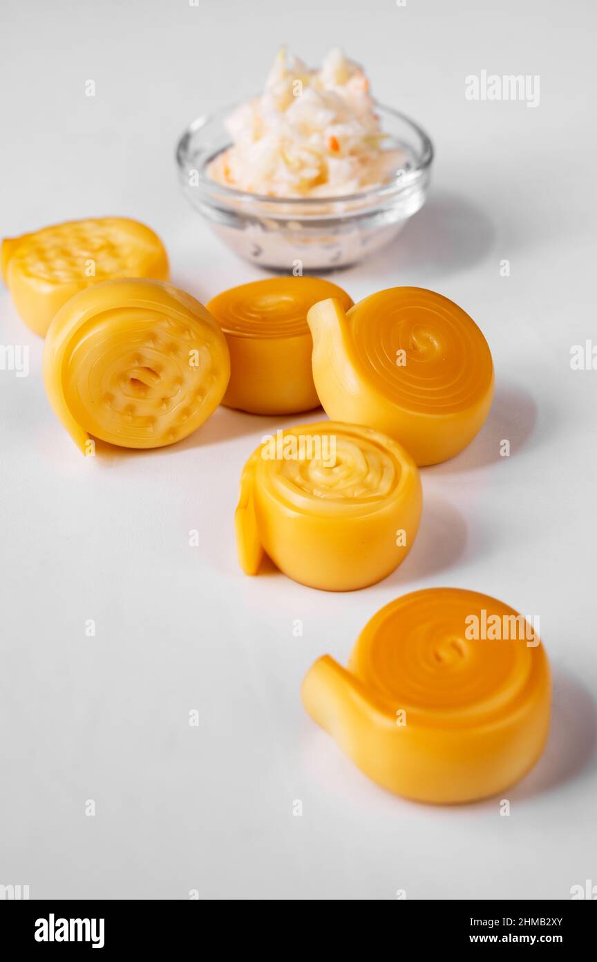 Traditional hand made slovak smoked cheese "parenica" , small rolled up ...