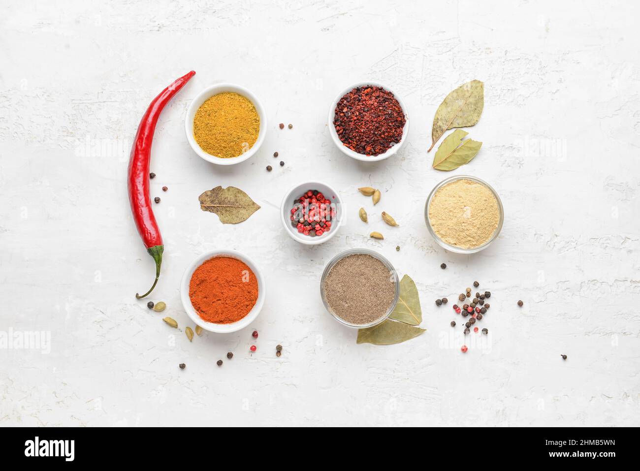 Set of different aromatic spices on light background Stock Photo - Alamy