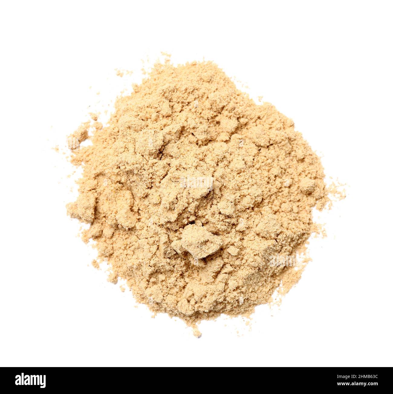 Heap of ginger powder isolated on white background Stock Photo - Alamy