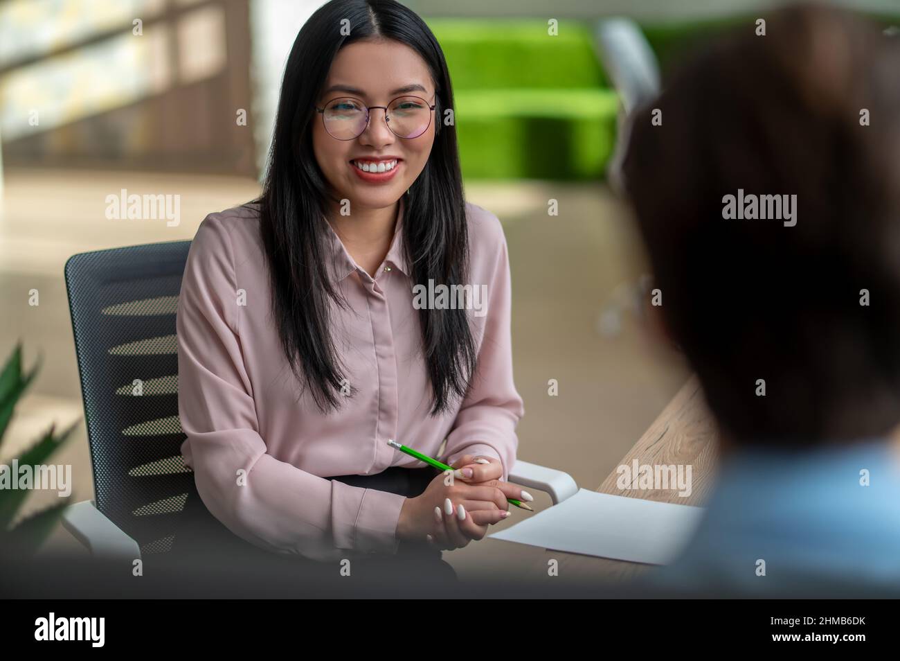 People sitting at the table and having negotiations Stock Photo - Alamy
