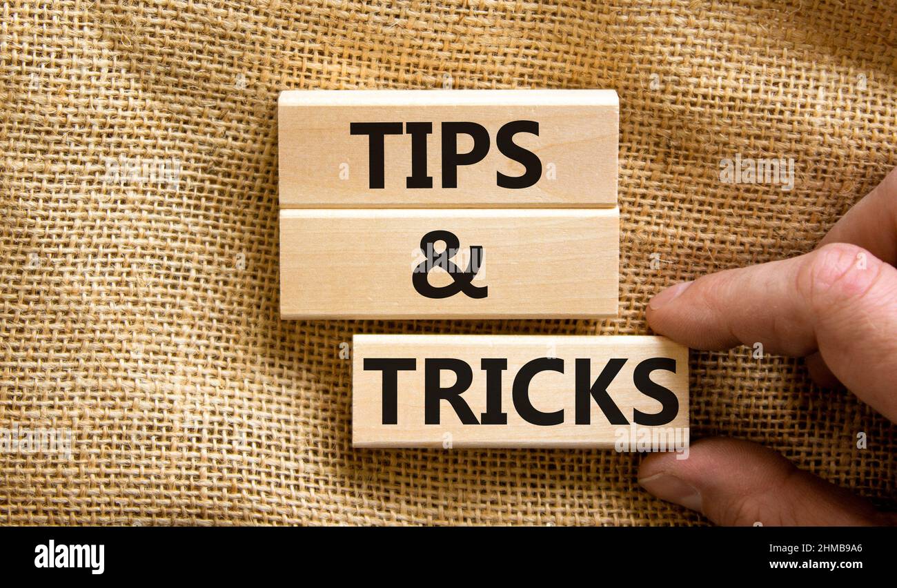 Tips and tricks symbol. Concept words Tips and tricks on wooden blocks ...