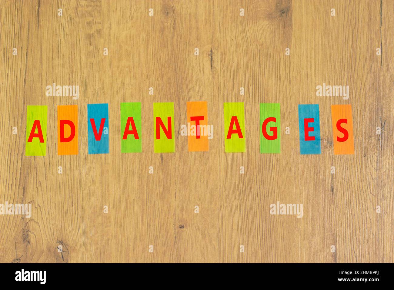 Advantages symbol. The concept word Advantages on colored papers on a ...