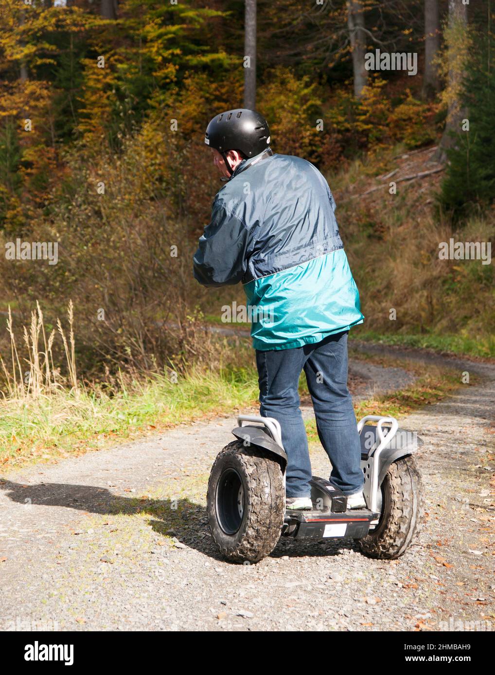 Man driving on segway in forest terrain Stock Photo - Alamy
