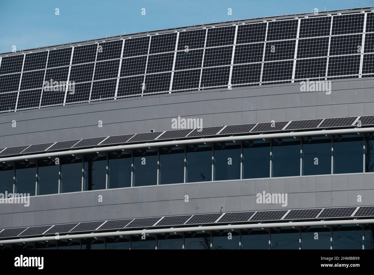 Solar Panels on Office Building Stock Photo - Alamy