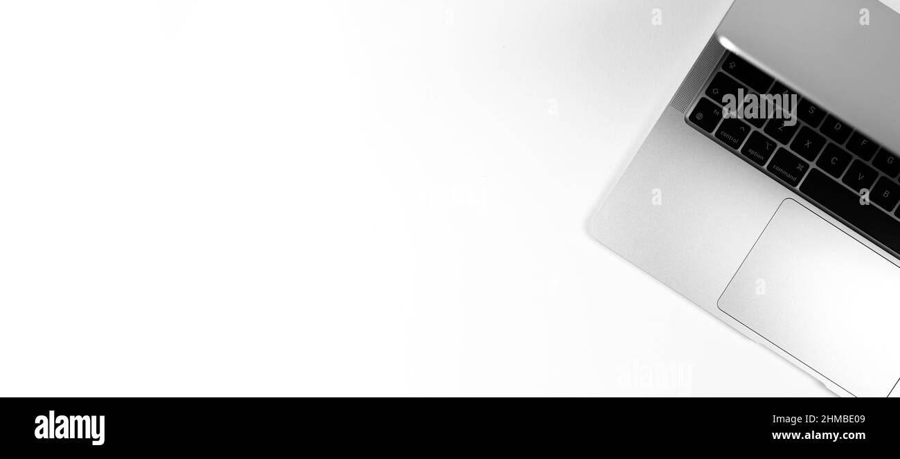 Modern laptop flat lay silver background. Notebook keyboard. Office ...