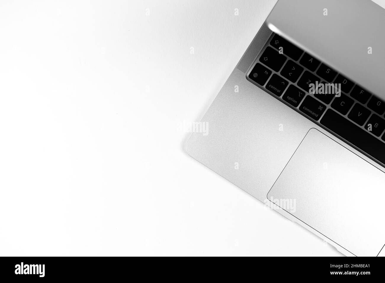 Modern laptop flat lay silver background. Notebook keyboard. Office ...