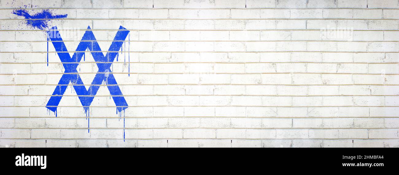 Banner heading Sabmyk XX symbol graffiti sprayed on white wall, copy ...
