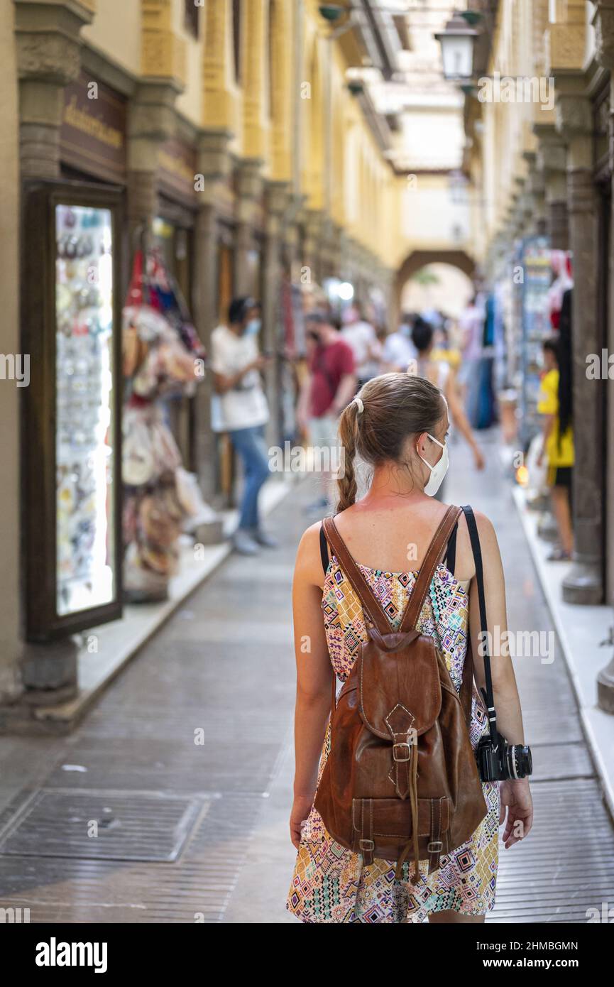 Young girl in the Santa Ana market wearing a mask Stock Photo - Alamy