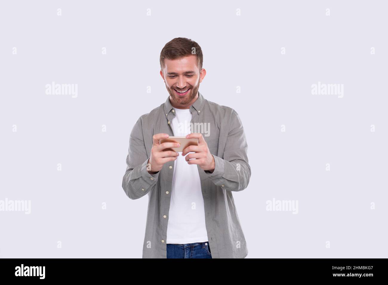 Man Playing Phone Games. Man Excited Playing Mobile games. Gamer ...