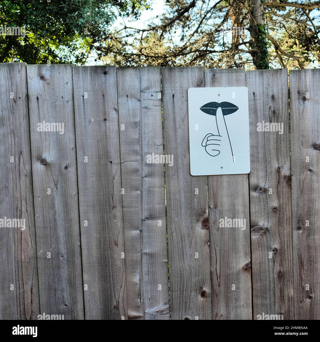 Shush sign with lips, hand, and finger signaling guests to keep quiet ...