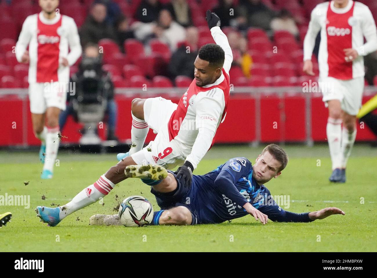 Lucas Schoofs of Heracles tackles Danilo Pereira da Silva of Ajax ...