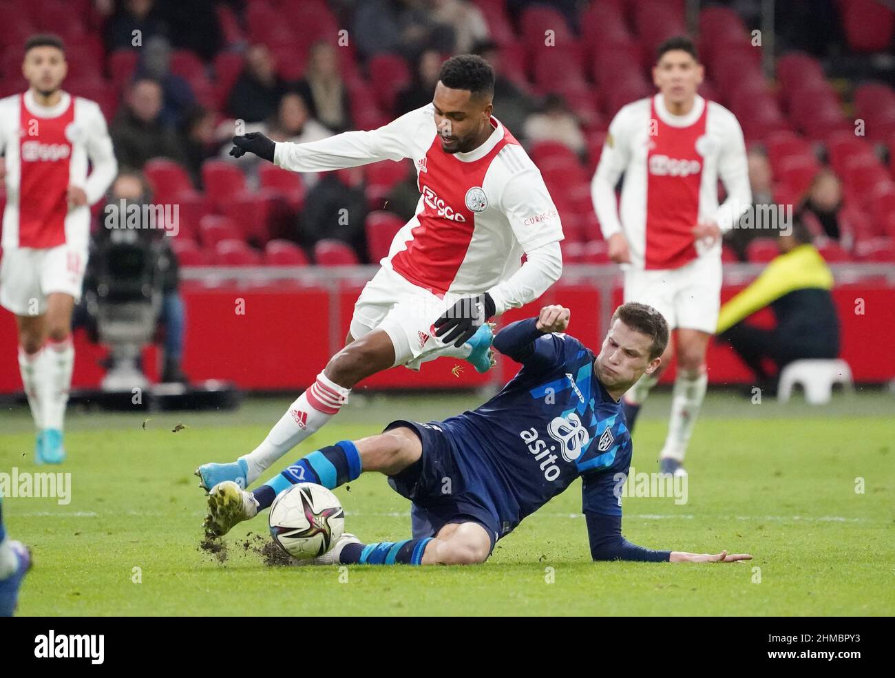 Lucas Schoofs of Heracles tackles Danilo Pereira da Silva of Ajax ...
