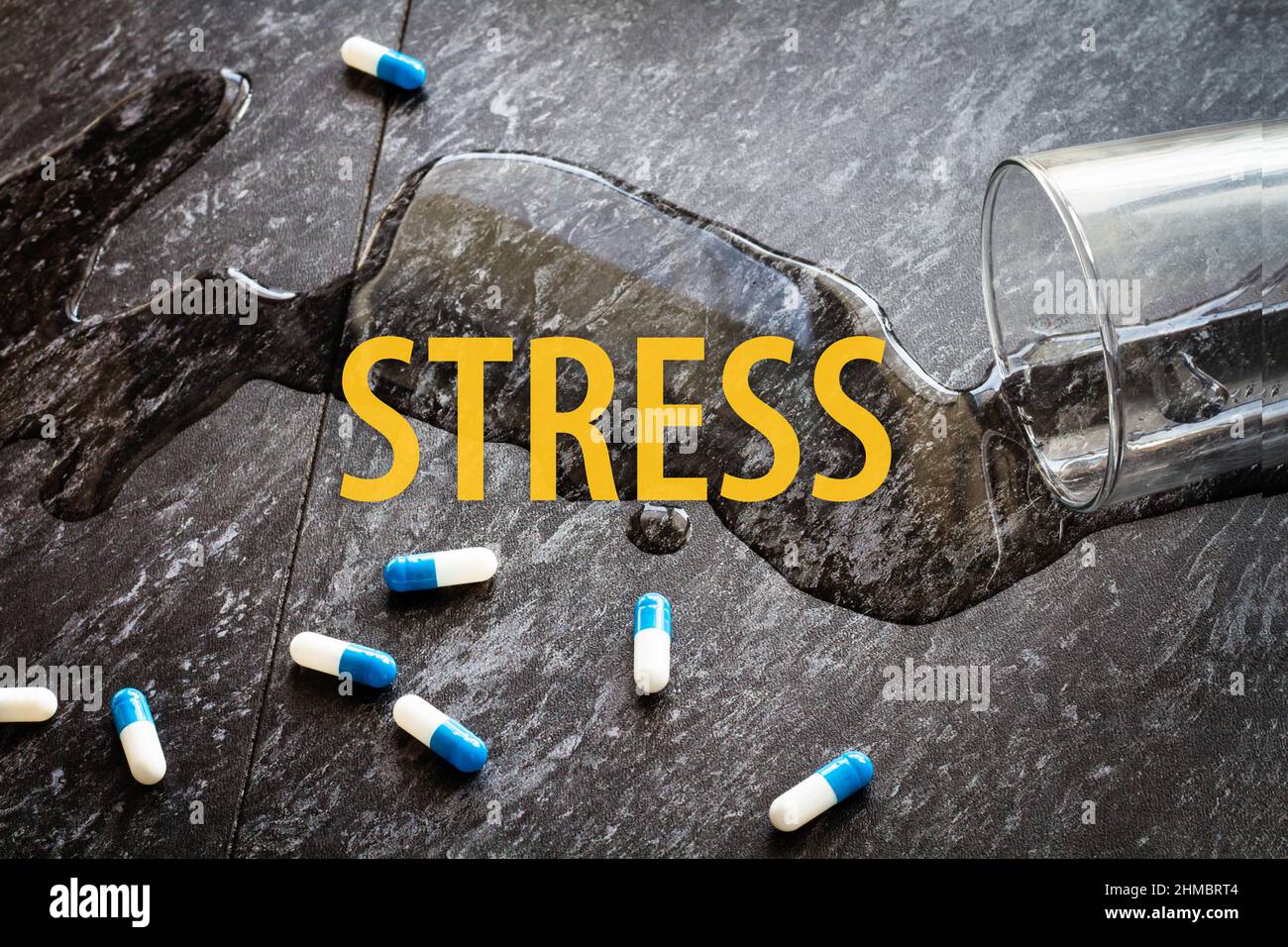 Tablets. Water is spilled and medical capsules are scattered. Ambulance ...