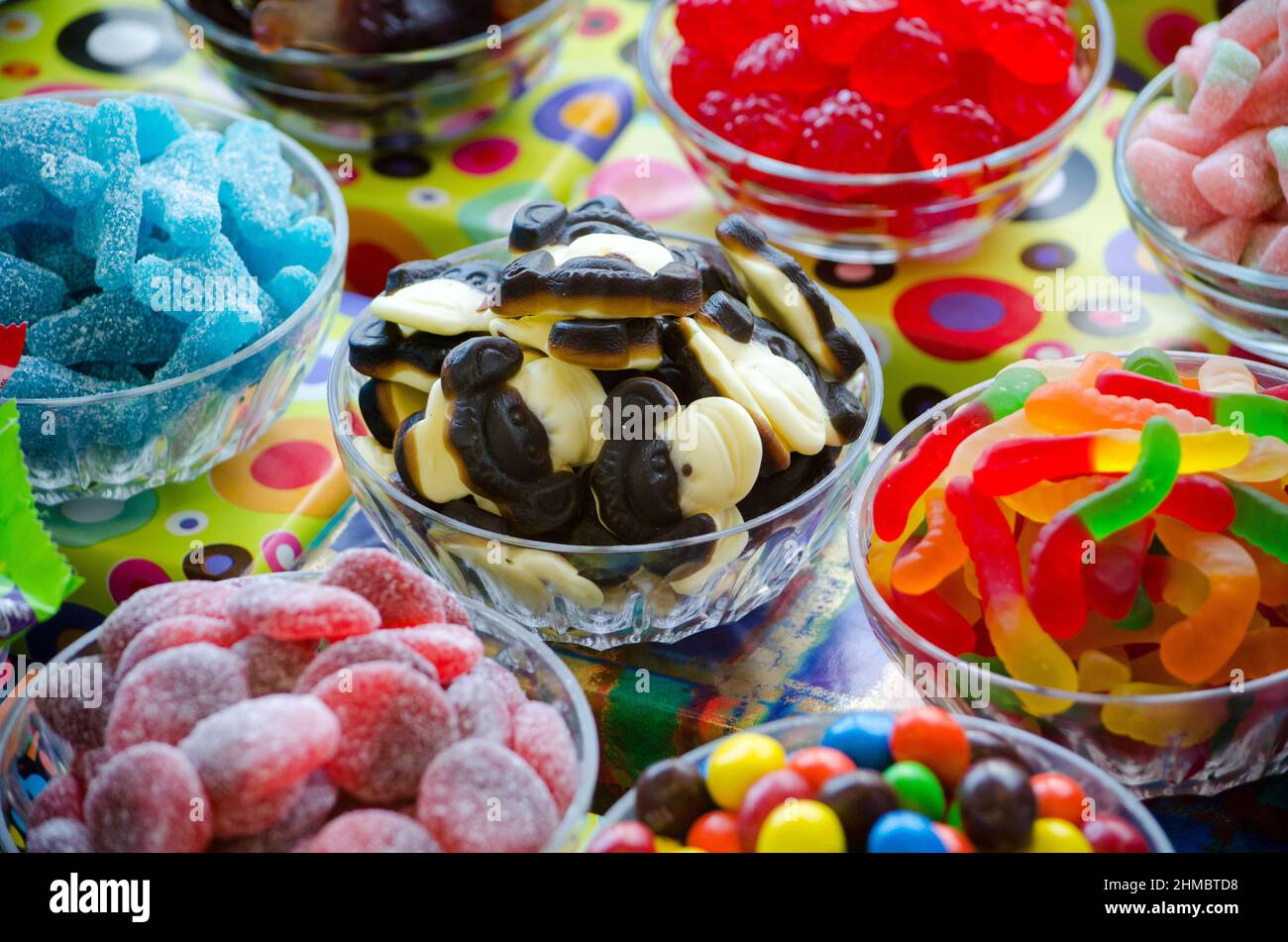 A yummy display of sweets show chewy and gooey candies from gummy to ...