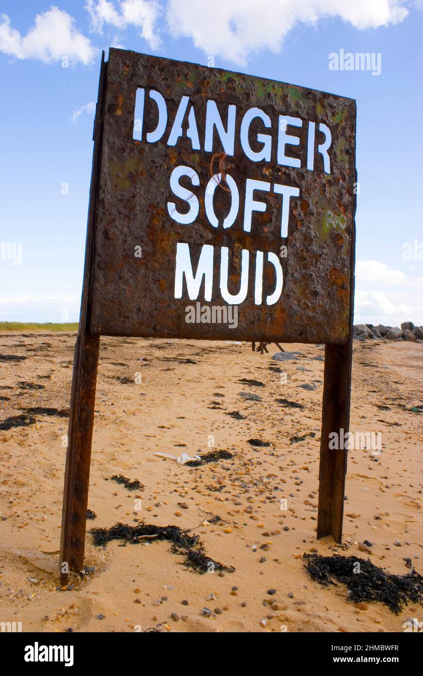Soft mud warning sign Stock Photo - Alamy