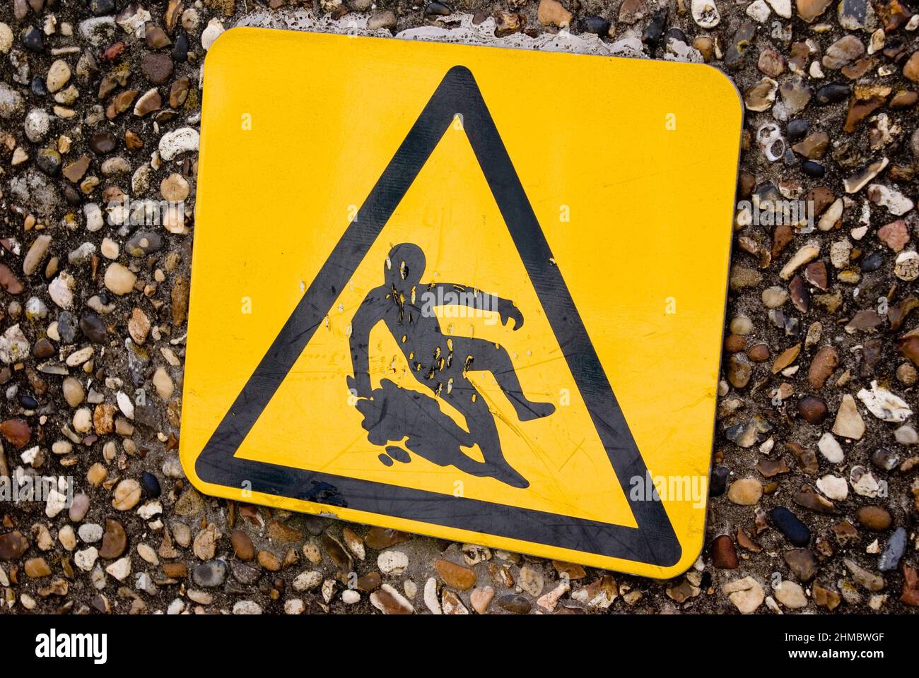 Slippery surface warning sign Stock Photo - Alamy