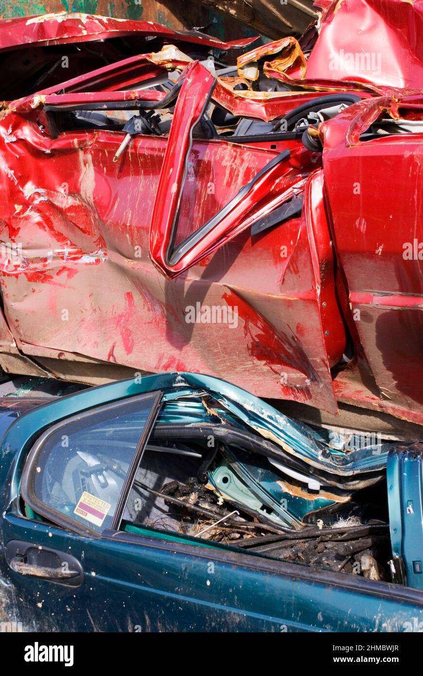 Crushed cars in a scrapyard Stock Photo - Alamy